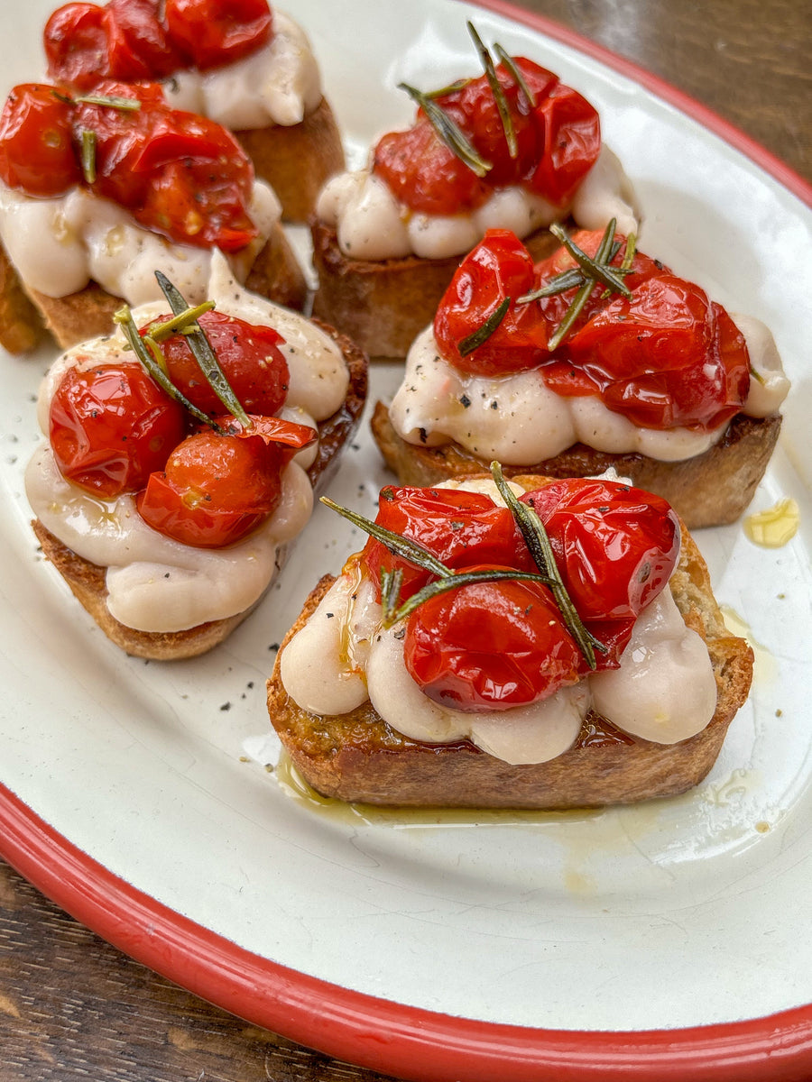 Bold Bean Co - White Bean Crostinis with Confit Garlic + Rosemary Tomatoes
